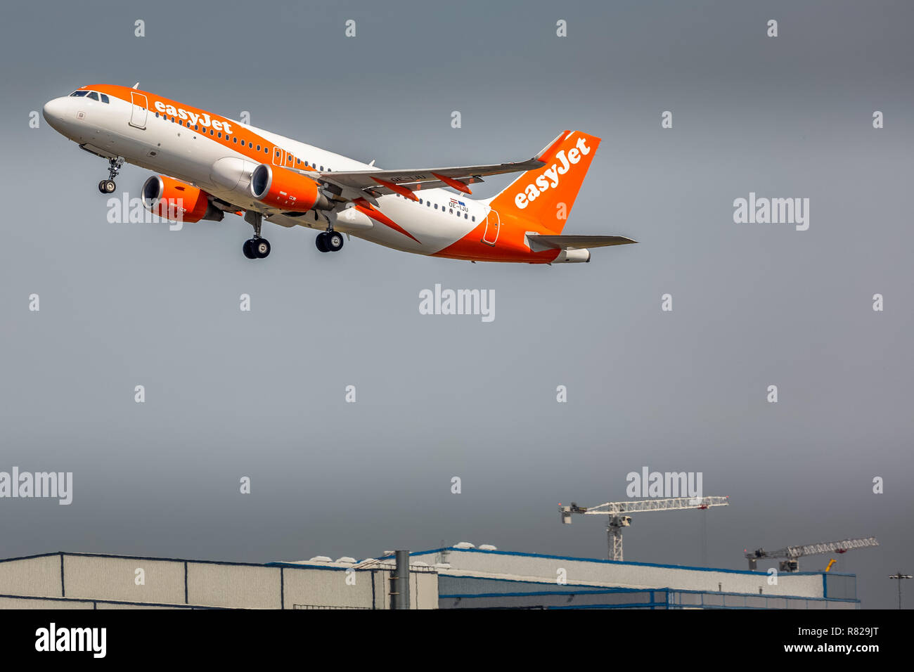 An Easyjet Airbus A320 aircraft, registration OE-IJU, taking off from ...