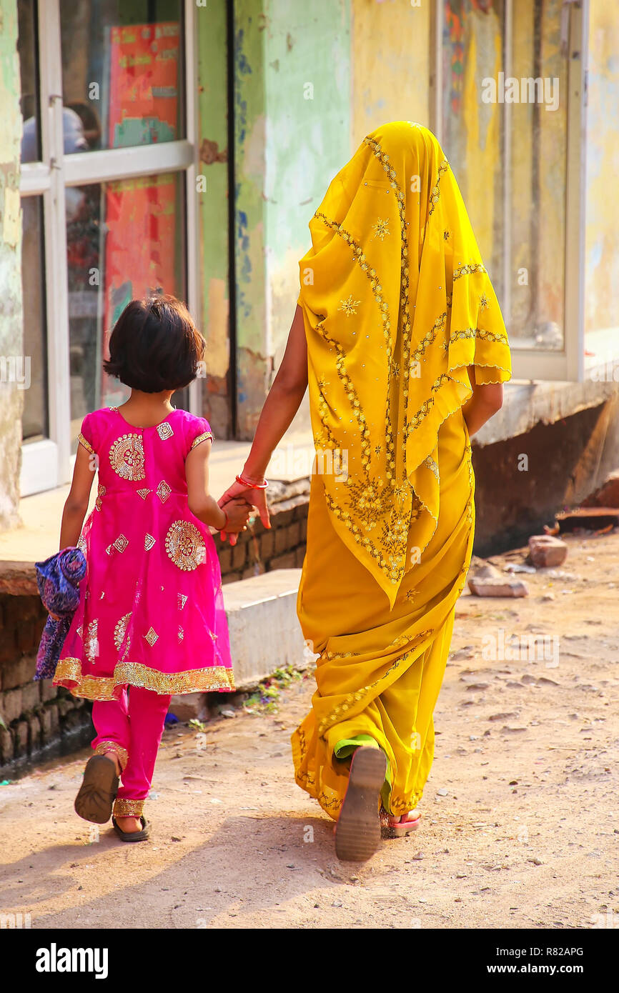 Woman in saree walking hi-res stock photography and images - Alamy