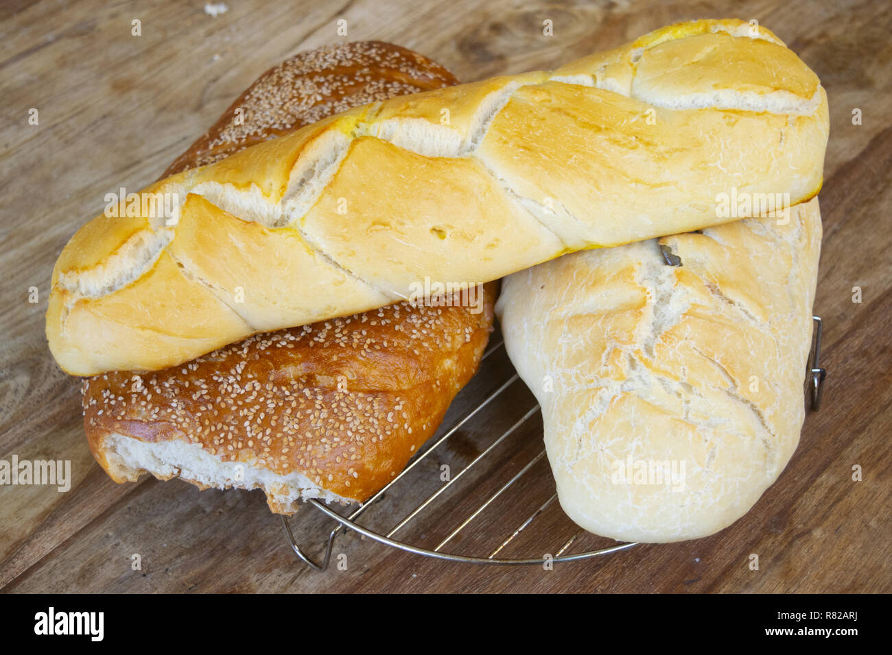 variety of French bread with baguette and sesame fougasse Stock Photo ...