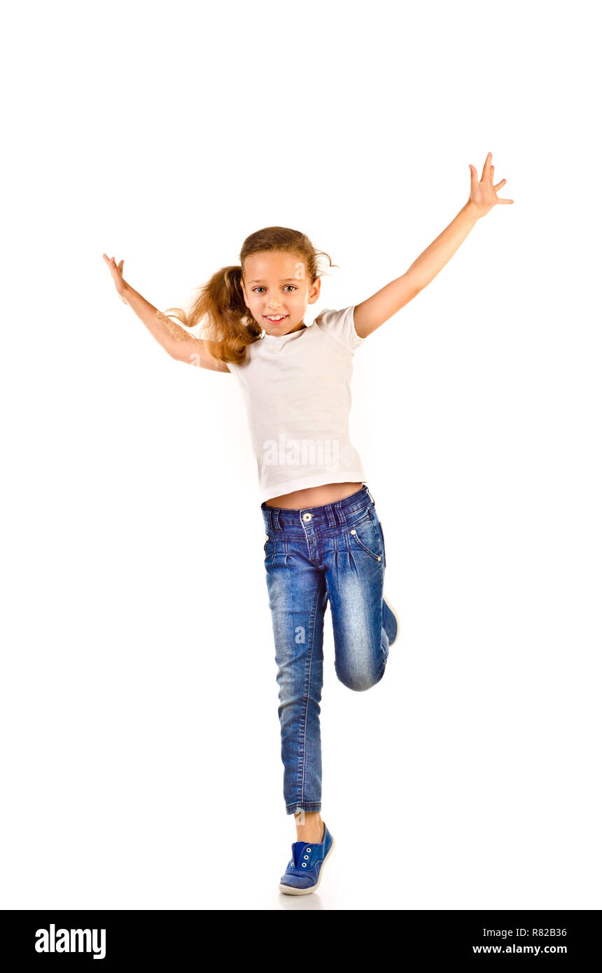 jumping little girl isolated on a white background Stock Photo - Alamy
