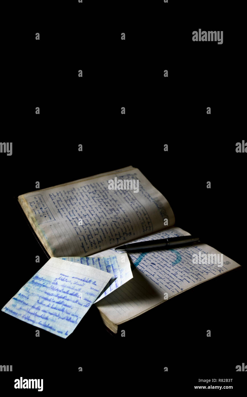 old manuscript with handwritten letters on black background Stock Photo ...
