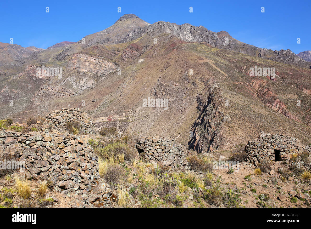 Pre-Incan round houses named colca near Chivay in Peru. Colcas are ...