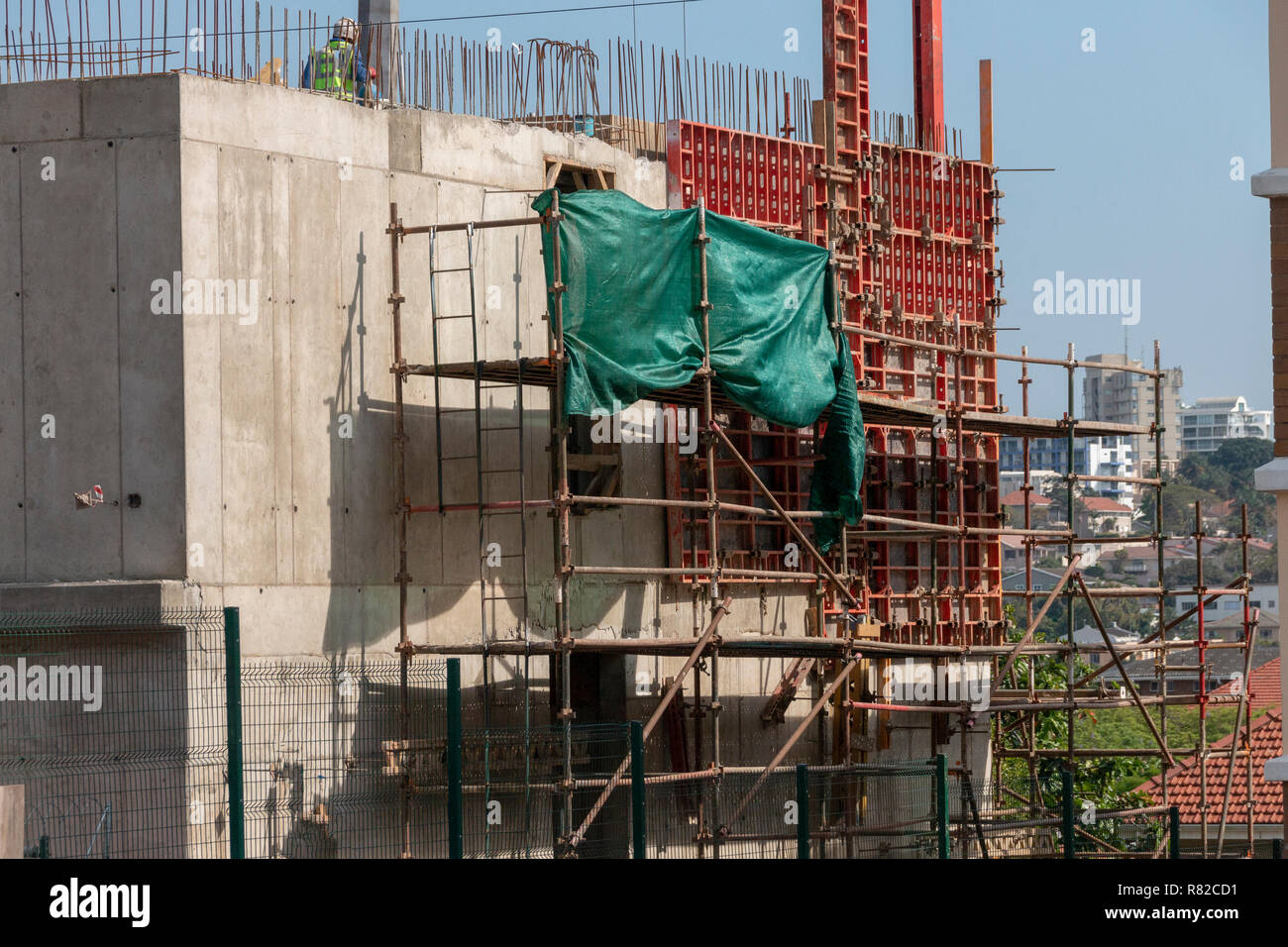 A close up view of a uncomplete new building been built where the ...