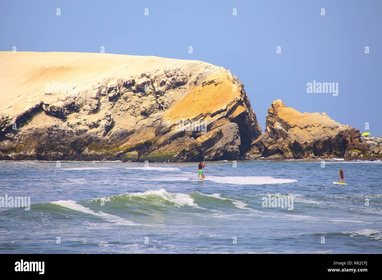 Rock formations and waves in Punta Hermosa, Peru. Punta Hermosa is a ...