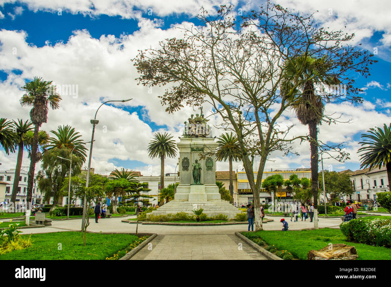 Latacunga, Ecuador, September, 28, 2018: With a stoned statue of virgin ...