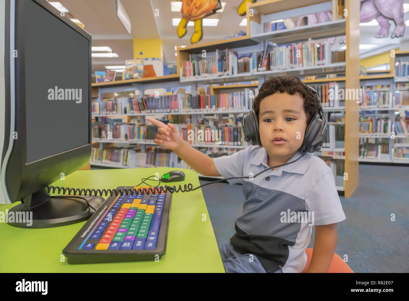 School kid using headphone classroom hi-res stock photography and ...