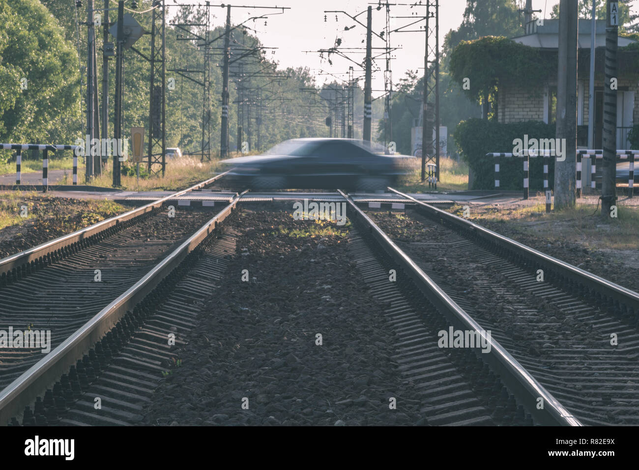 railroad tracks and ground details in summer - vintage retro film look ...