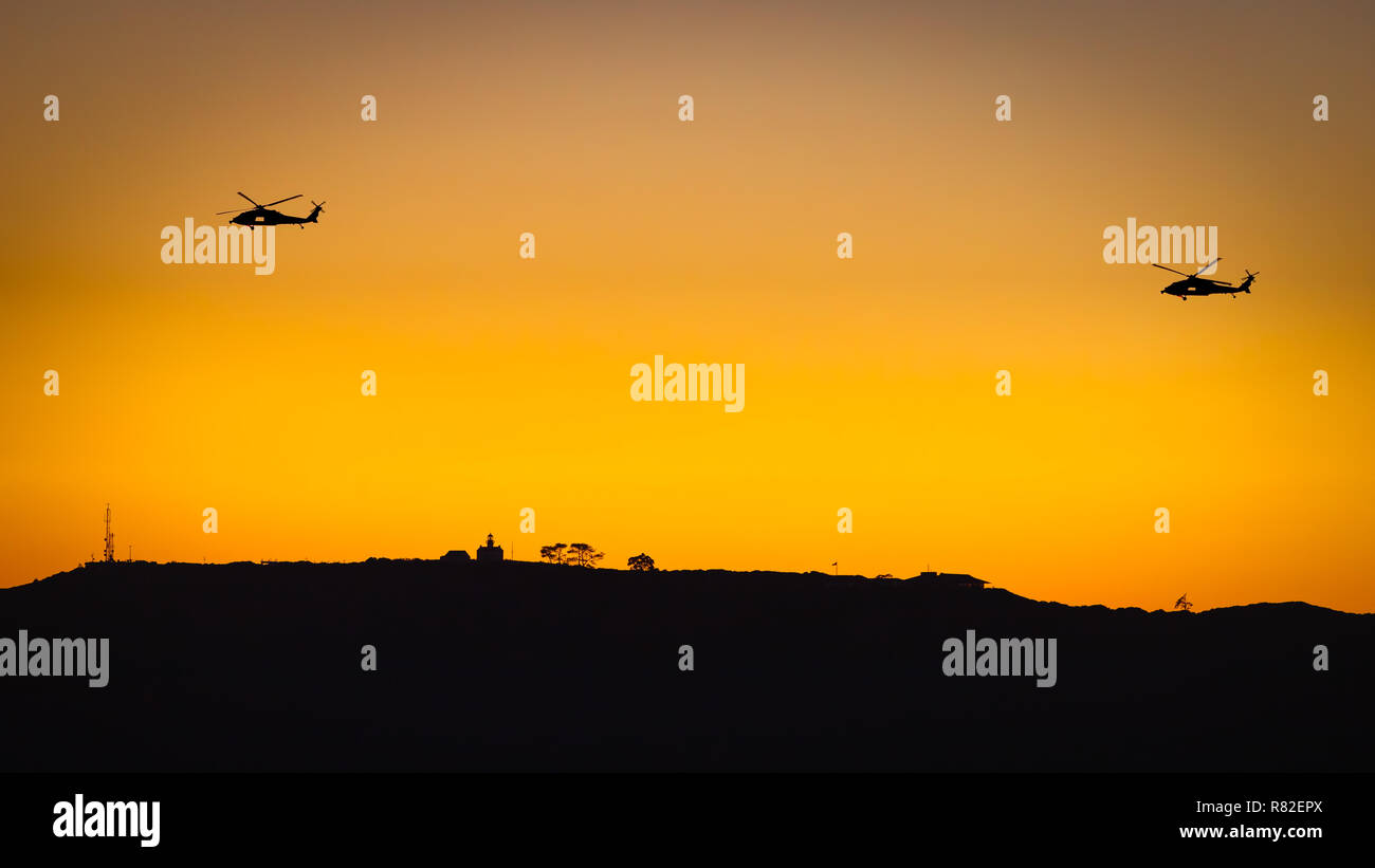 Helicopter pilot flying sunset hi-res stock photography and images - Alamy