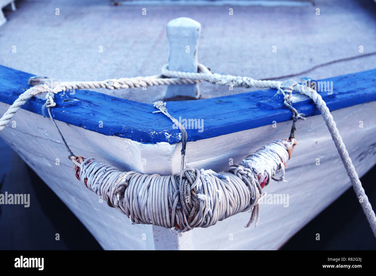 rope on a boat with wooden details Stock Photo - Alamy