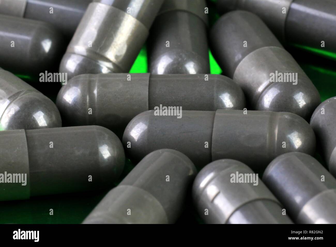 Black capsule hi-res stock photography and images - Alamy