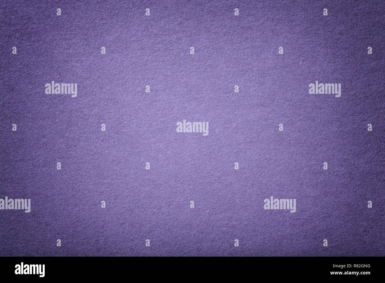 Dark violet matte background of suede fabric, closeup. Velvet texture ...