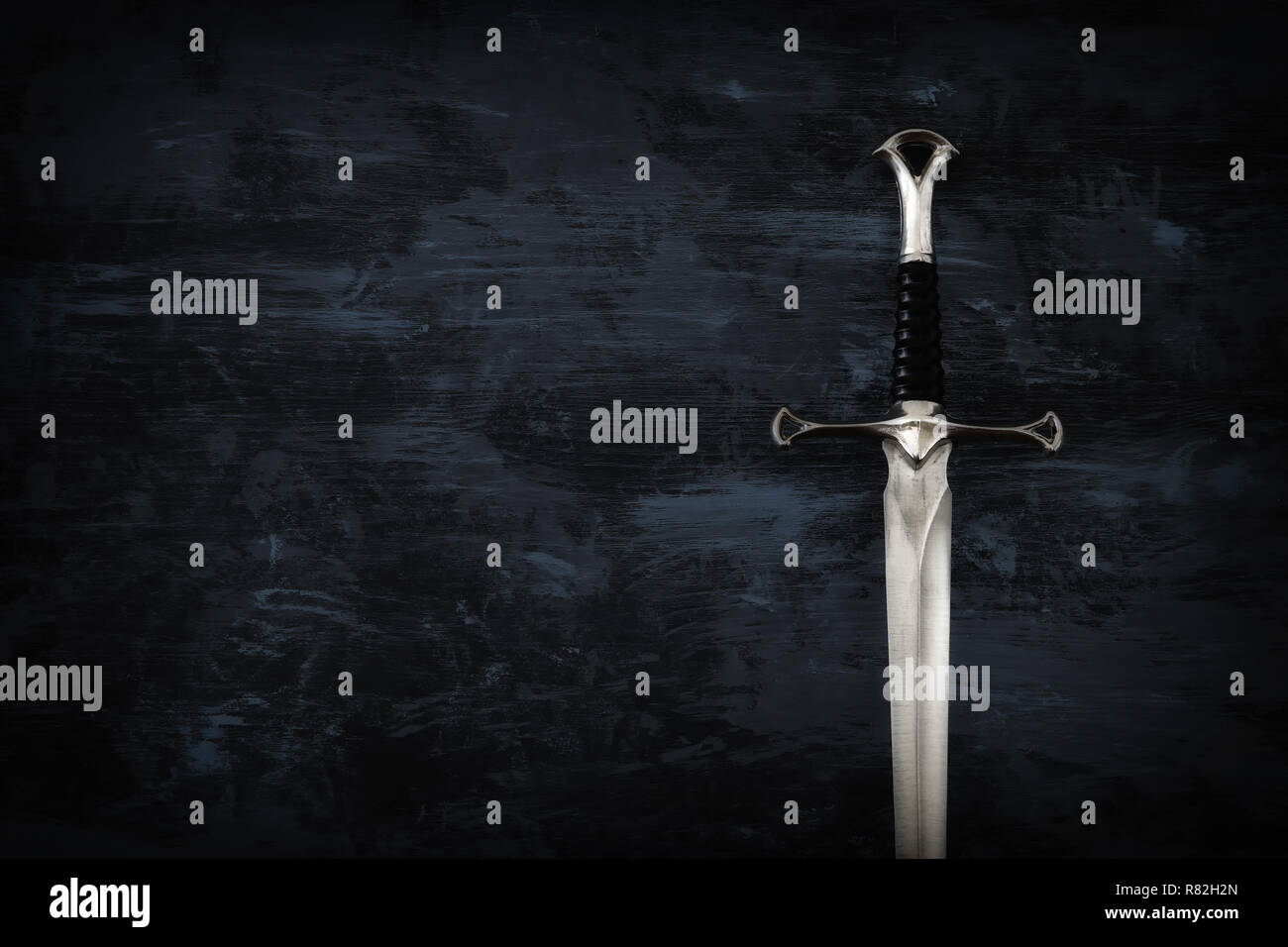 low key image of silver sword. fantasy medieval period Stock Photo - Alamy