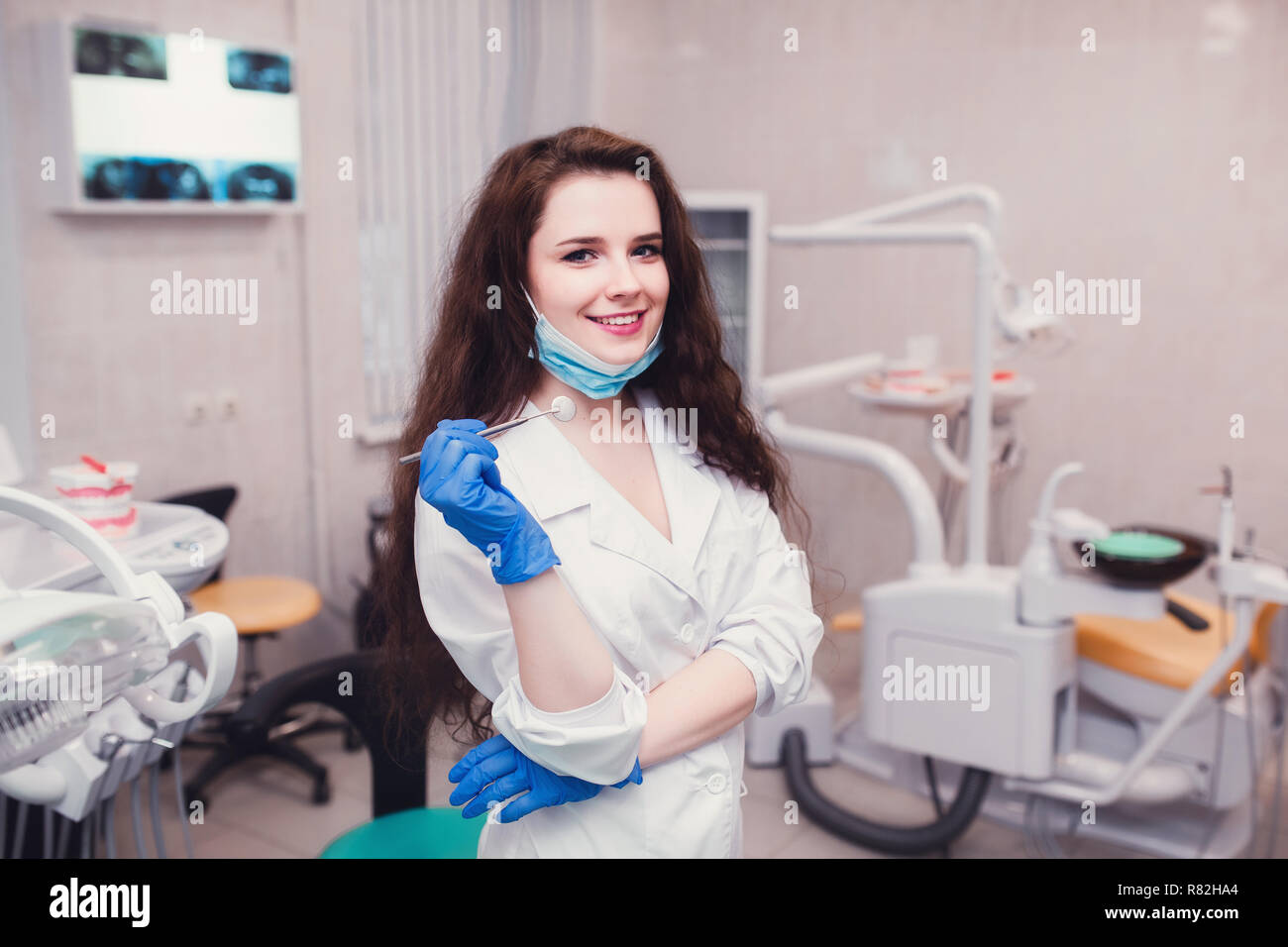 dentistry student standing in a dental treatment room Stock Photo - Alamy