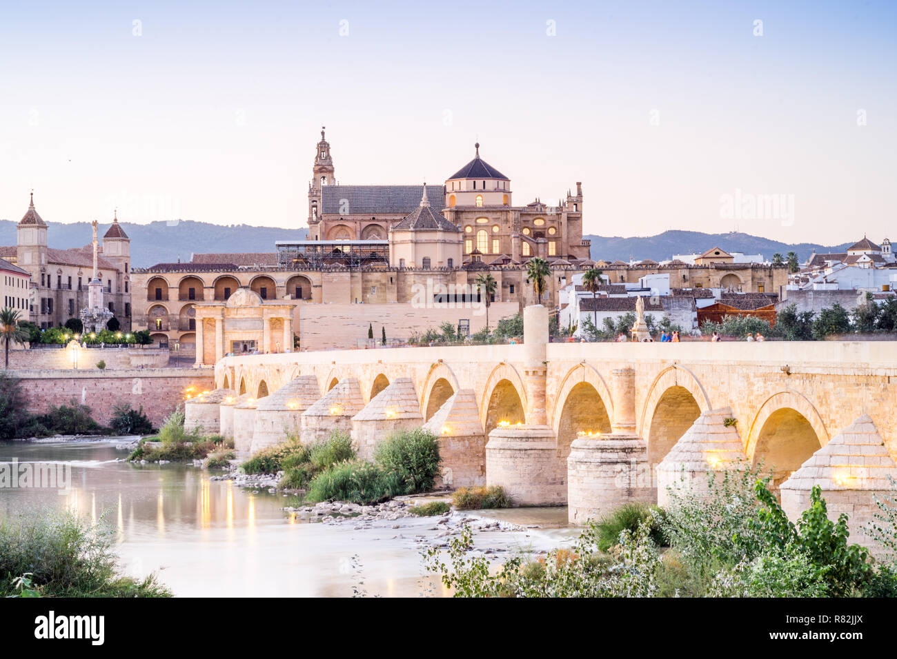 Roman bridge and cathedral - mosque as landmarks of Cordoba, Andalusia ...