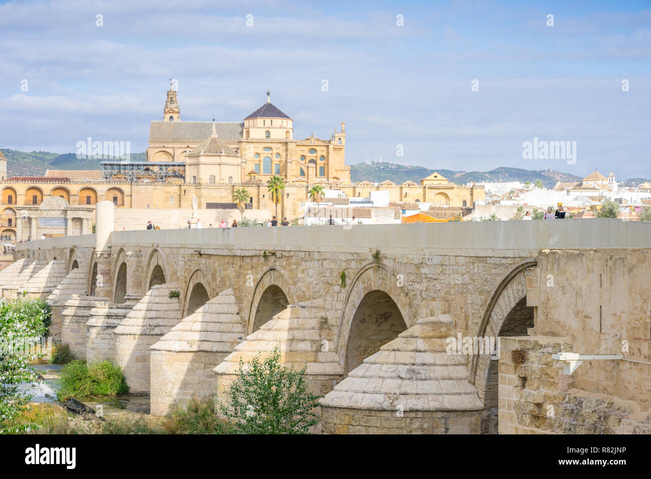 Roman bridge and cathedral - mosque as landmarks of Cordoba, Andalusia ...