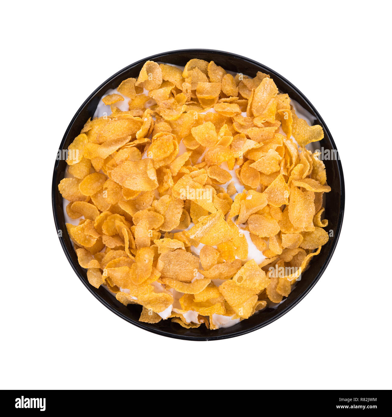Corn flakes with milk isolated on white background Stock Photo - Alamy