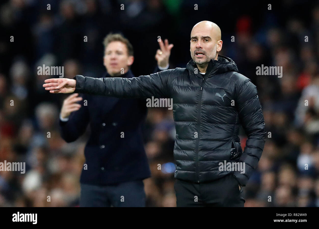 Hoffenheim manager Julian Nagelsmann (left) and Manchester City manager ...