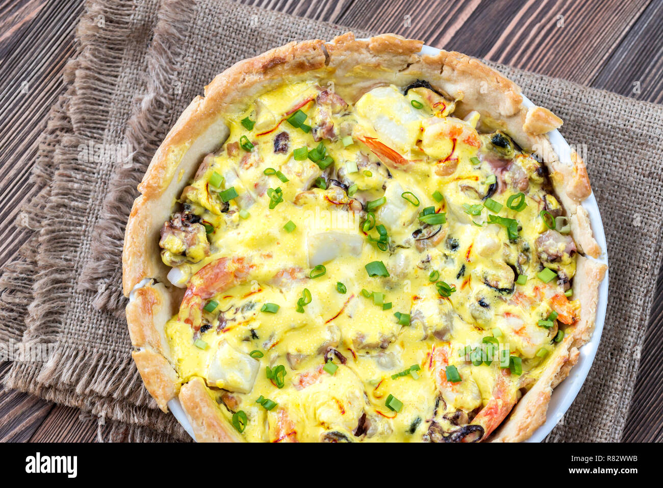Seafood pie with saffron cream sauce Stock Photo - Alamy