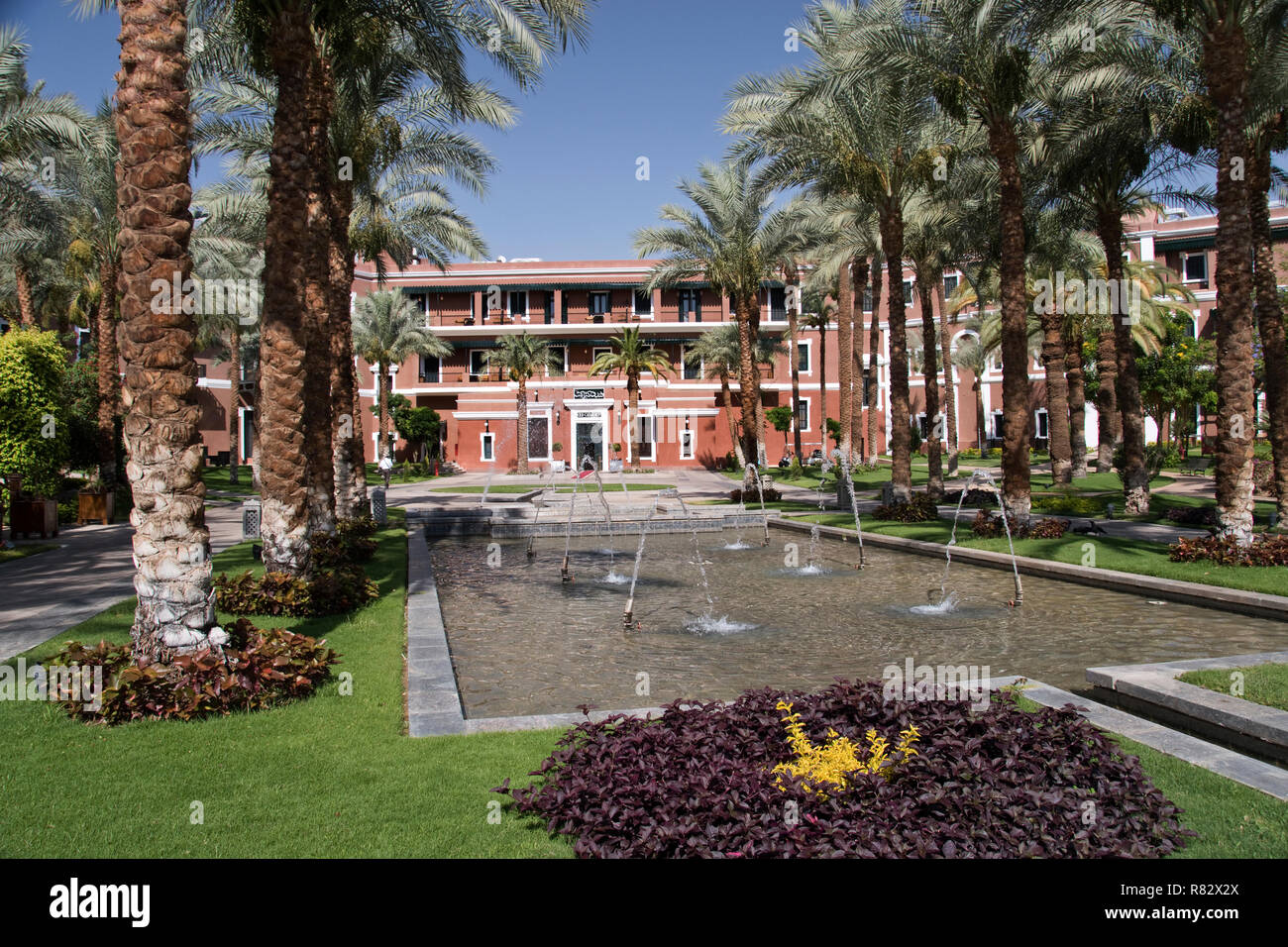 The gardens and fountain of the Old Cataract Hotel, an historic British ...
