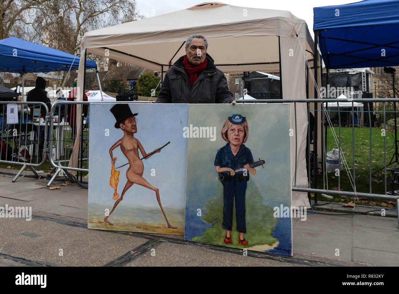 London, UK. 12th December 2018: Satirical artist Kaya Mar poses with ...