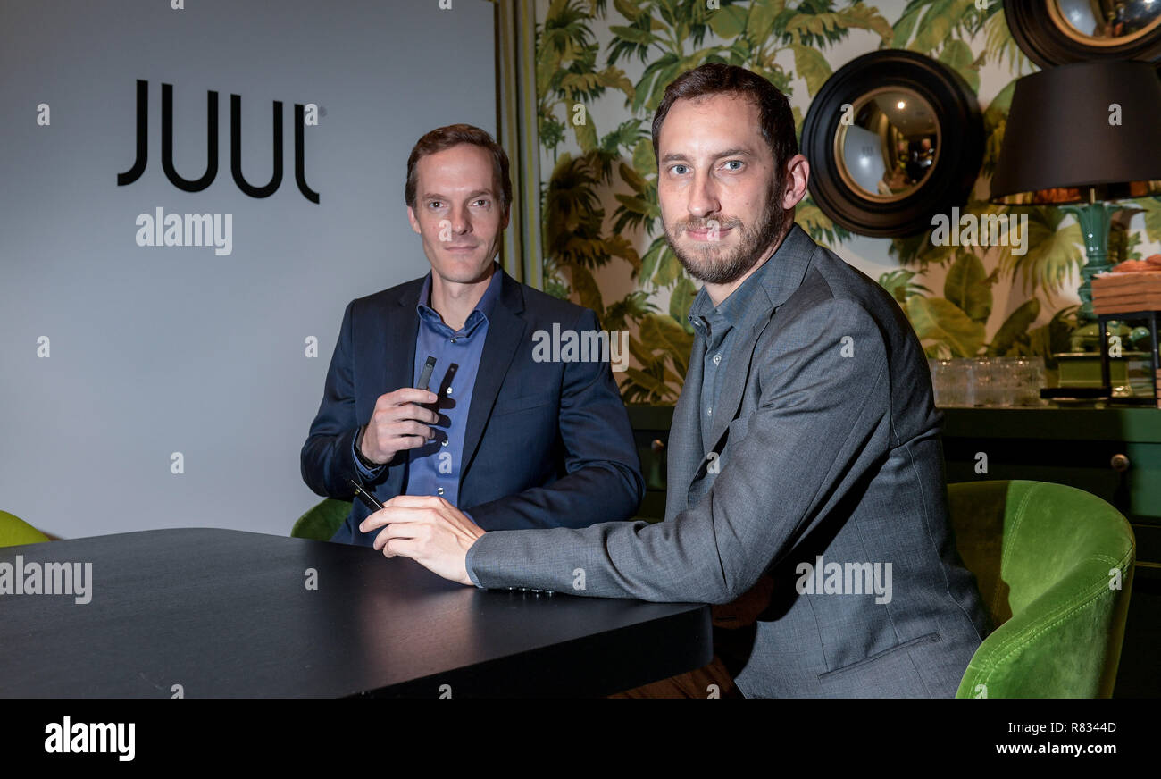 Hamburg, Germany. 12th Dec, 2018. James Monsees (r) and Adam Bowen ...