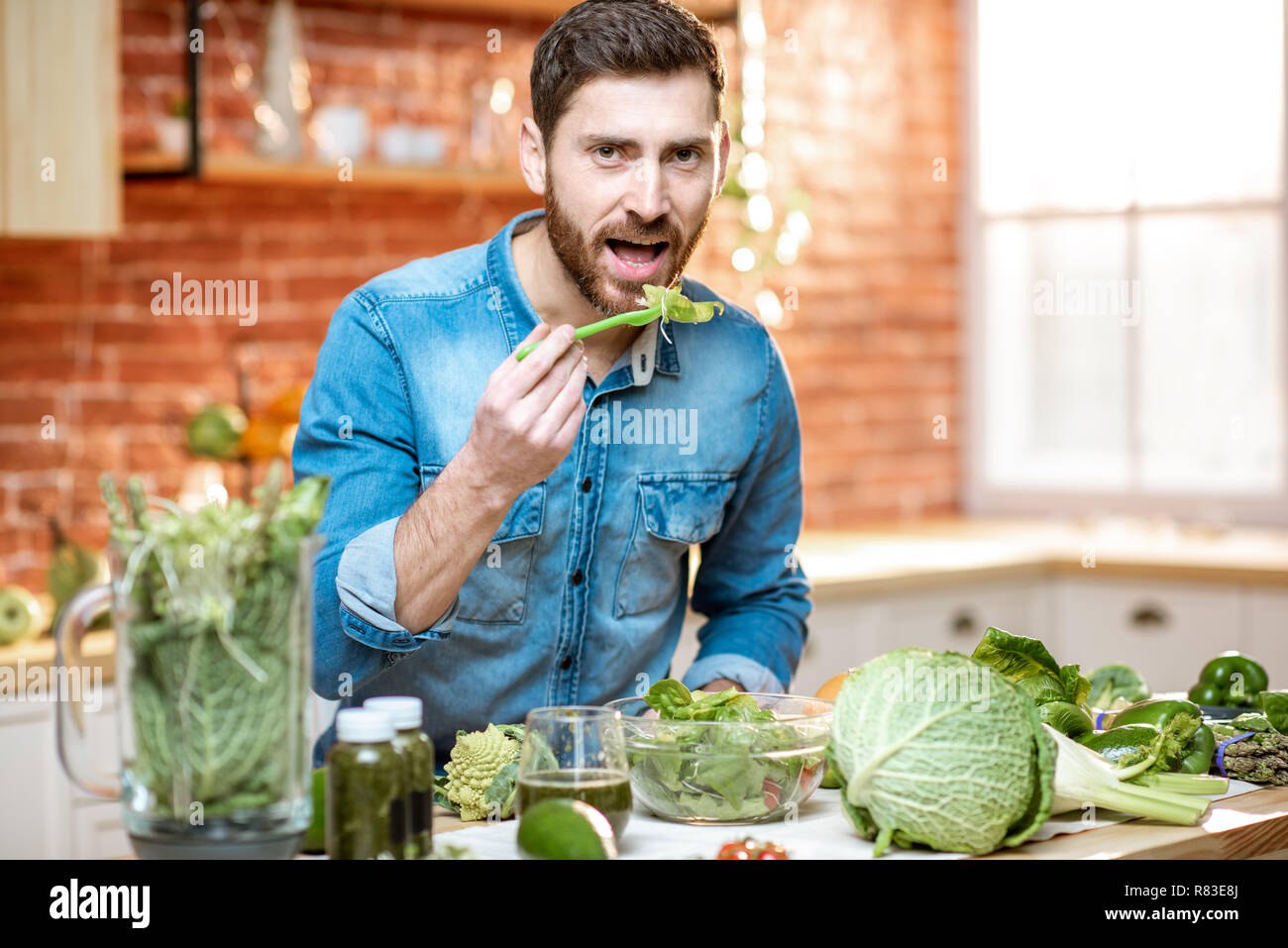 Man Eating Tomato High Resolution Stock Photography and Images - Alamy