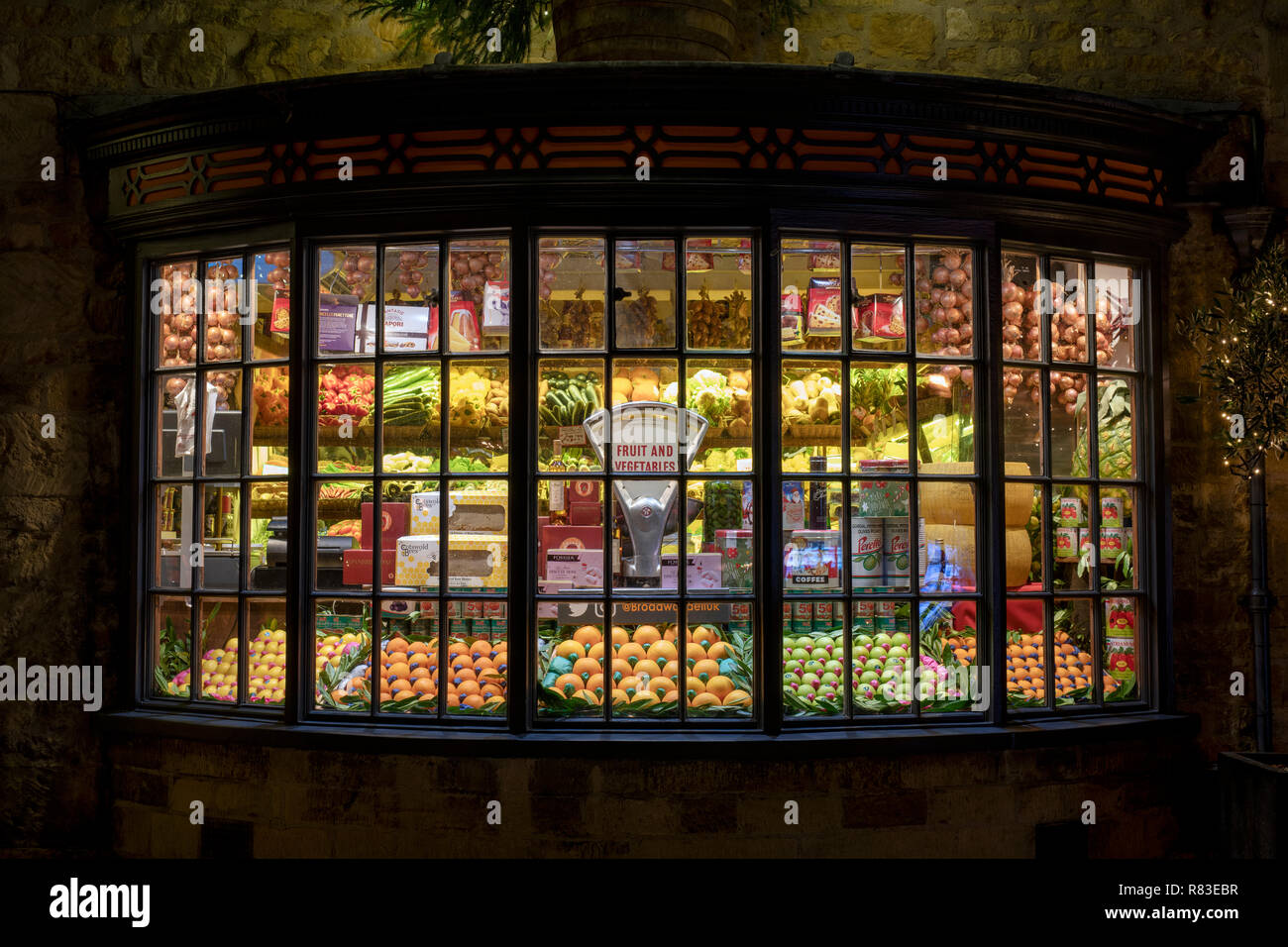The Broadway Deli fruit and vegetable window display at night. Broadway ...