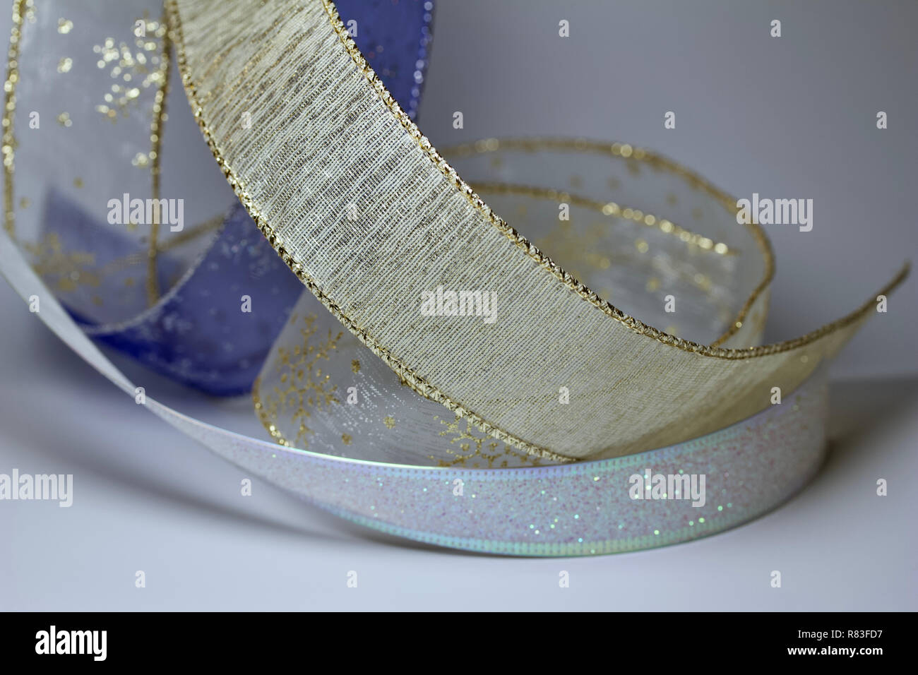 Abstract macro background of beautiful gold colored fabric ribbon with ...