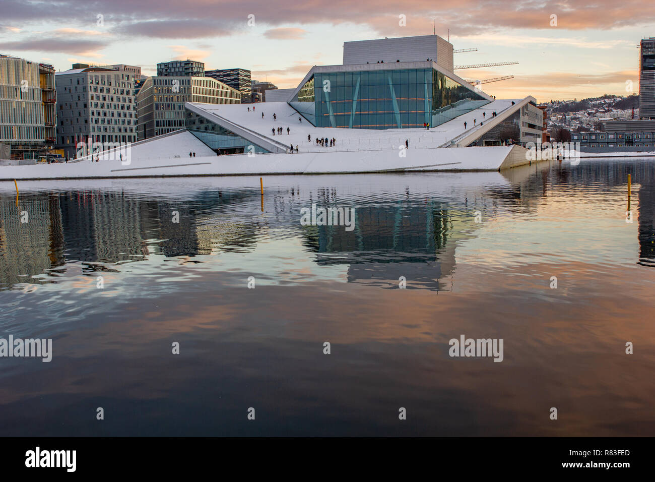 Norwegian Opera house and new Munch museum in construction at sunset in ...