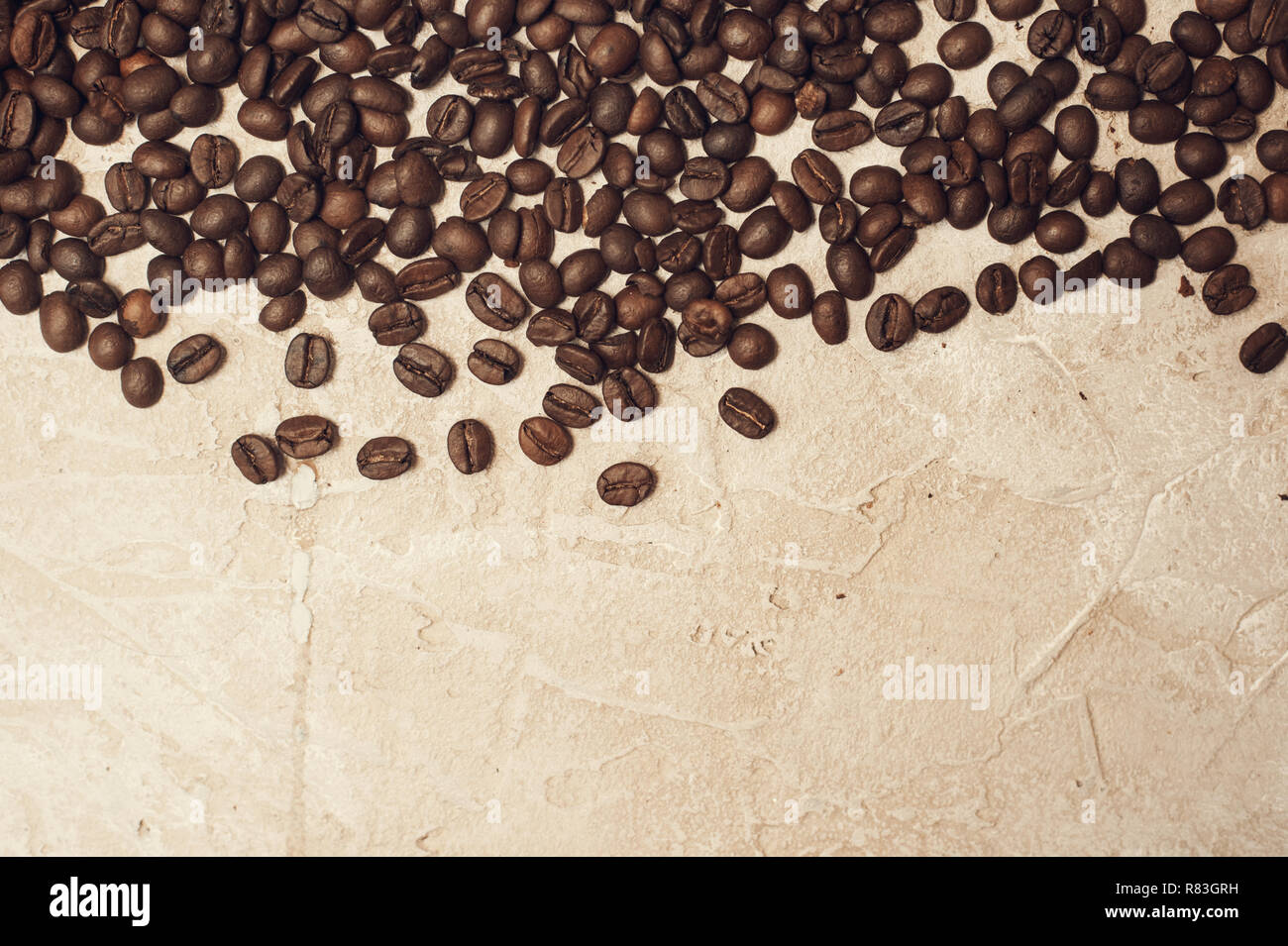 Coffee beans on top view background Stock Photo - Alamy