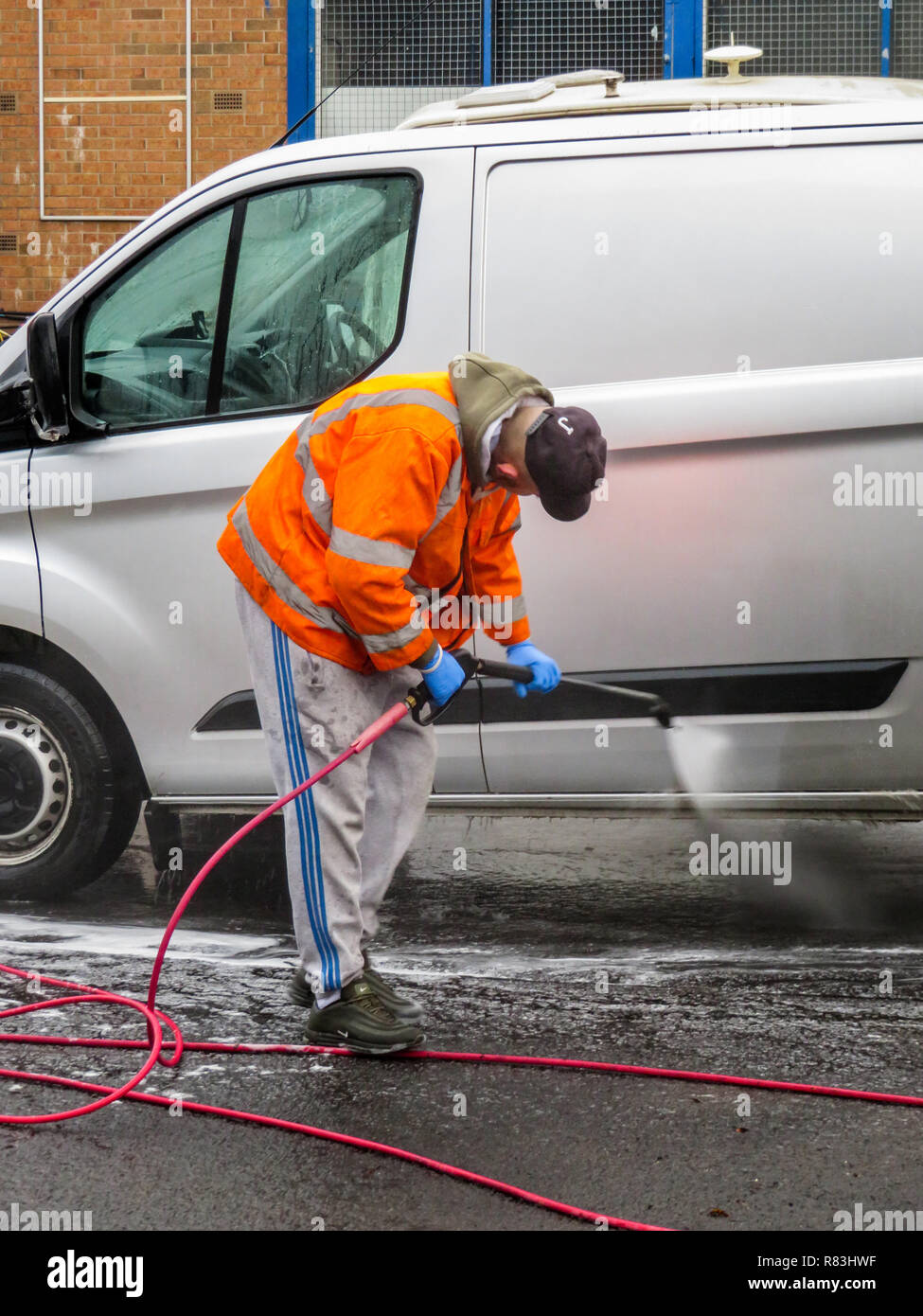 Man using high pressure water jet hi-res stock photography and images ...