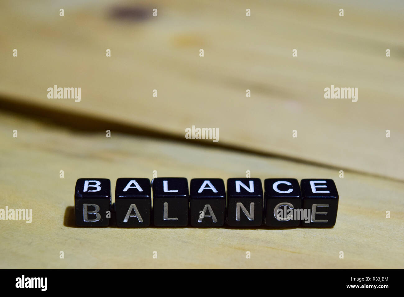 Balance written on wooden blocks. education and motivation concepts ...