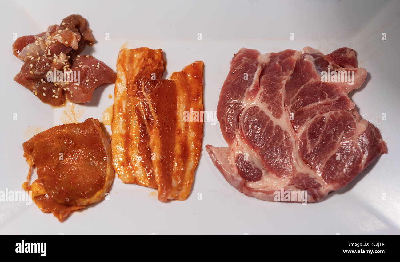 raw pork with sauce prepare for bbq grill Stock Photo - Alamy
