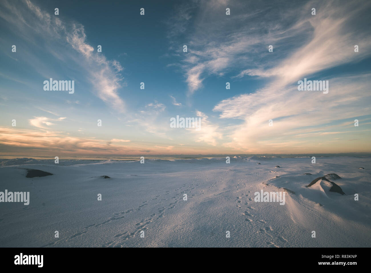 frozen sea side beach panorama in winter with lots of ice and snow in ...