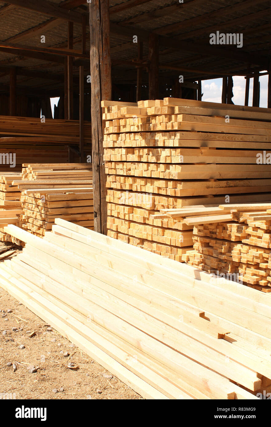 Wooden boards in a warehouse of building materials Stock Photo - Alamy