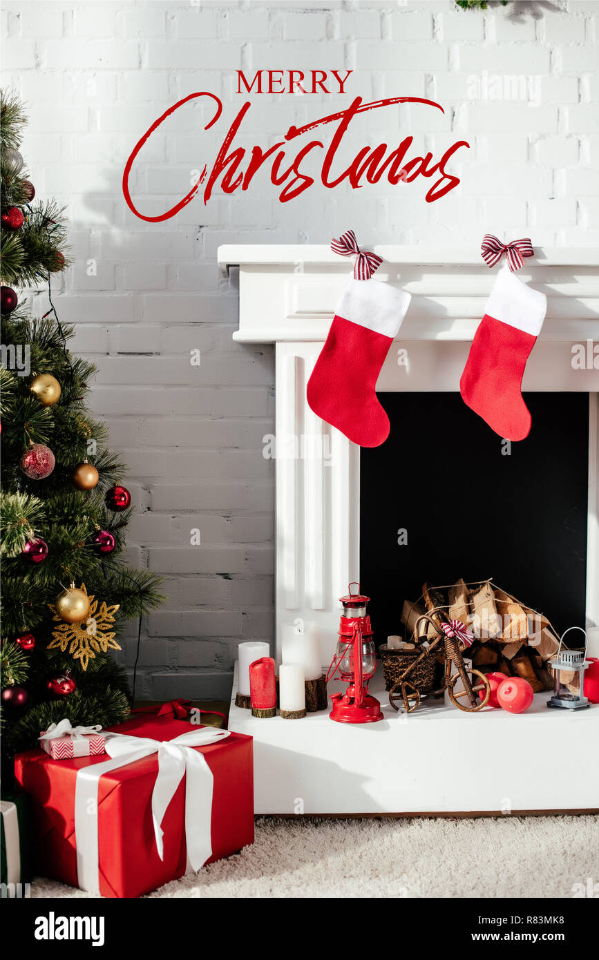 christmas tree with bubbles, gift boxes and fireplace with christmas ...