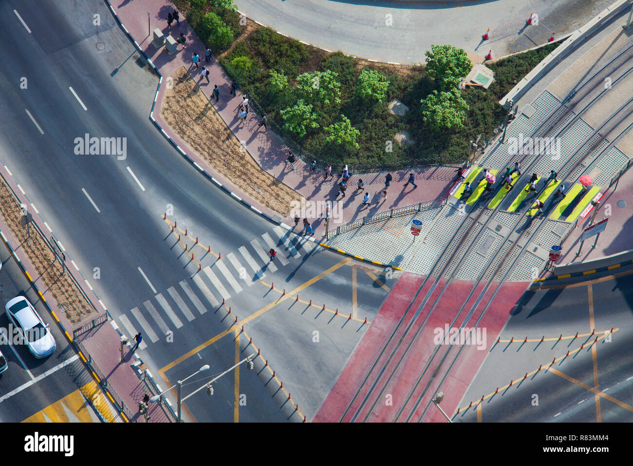 people crossing the road on zebra, city center of Dubai Stock Photo - Alamy