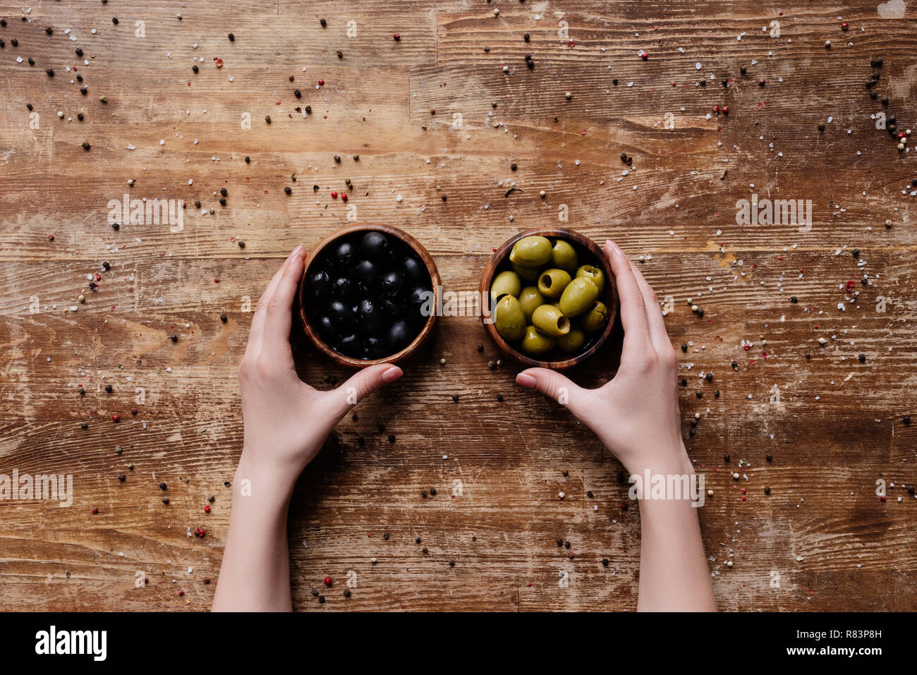Two holding bowls hi-res stock photography and images - Alamy
