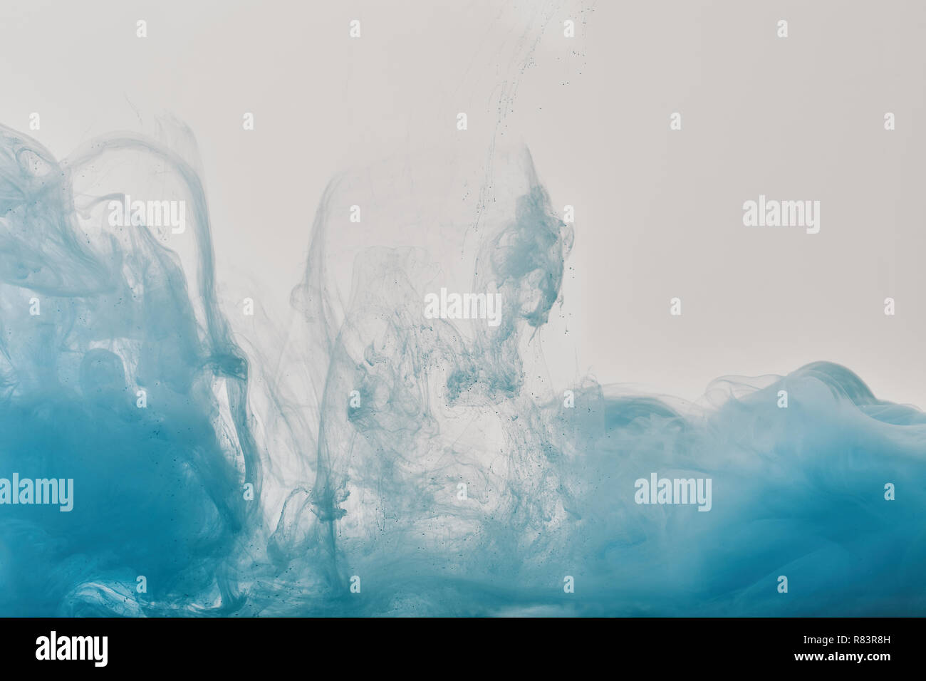 abstract design with blue paint swirls Stock Photo - Alamy