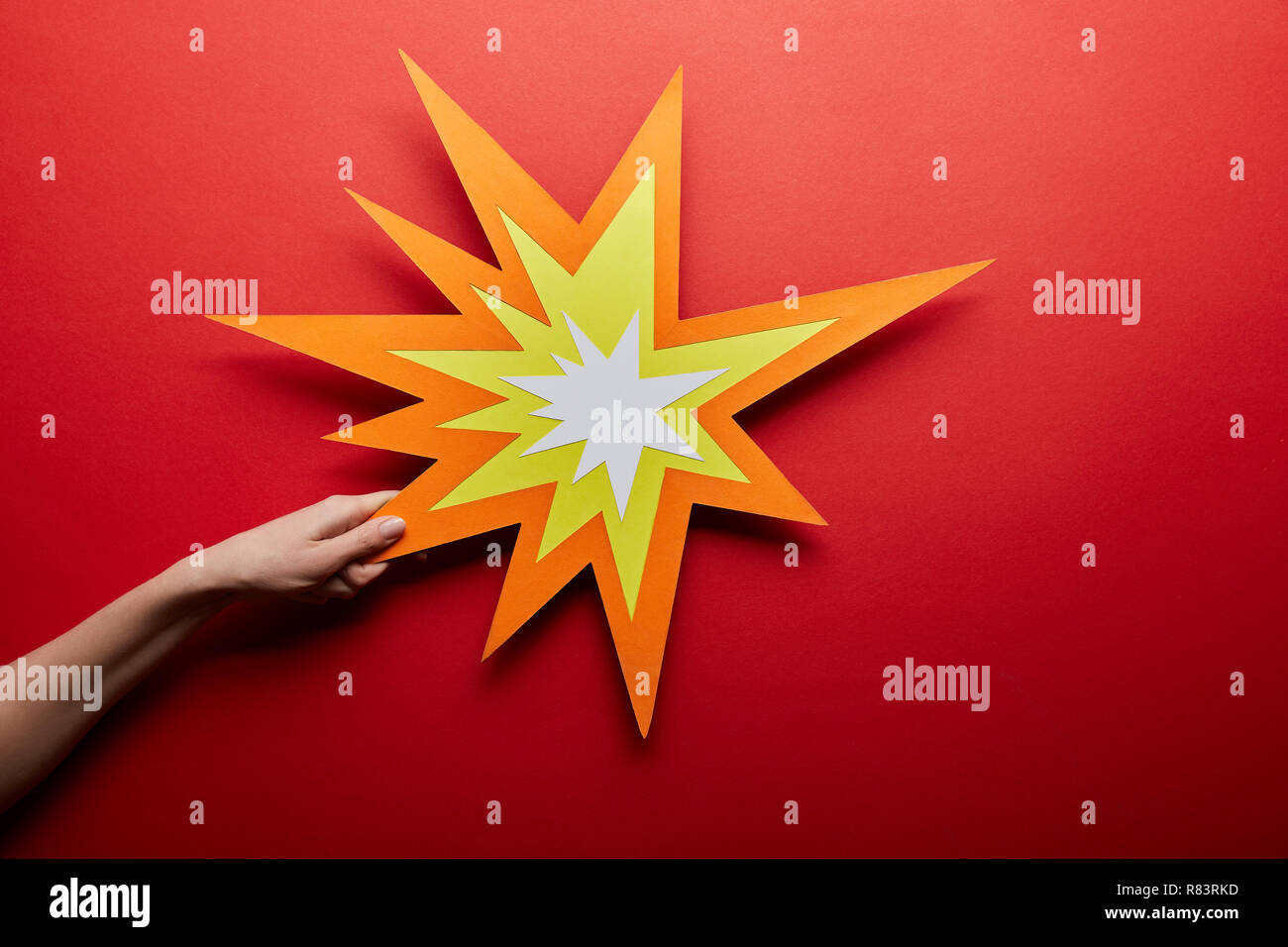 top view of empty orange bang sign on red background Stock Photo - Alamy