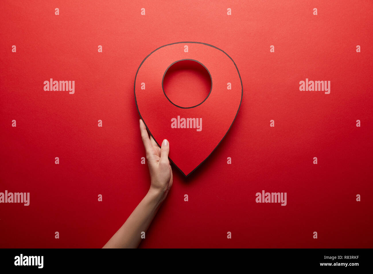 top view of red handmade geolocation symbol on red background Stock ...