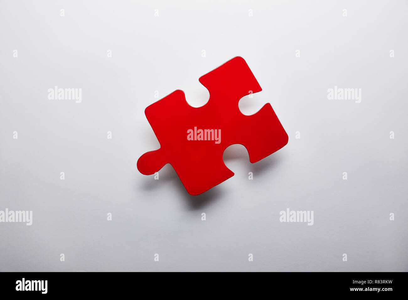 top view of red puzzle problem solution symbol on grey background Stock ...