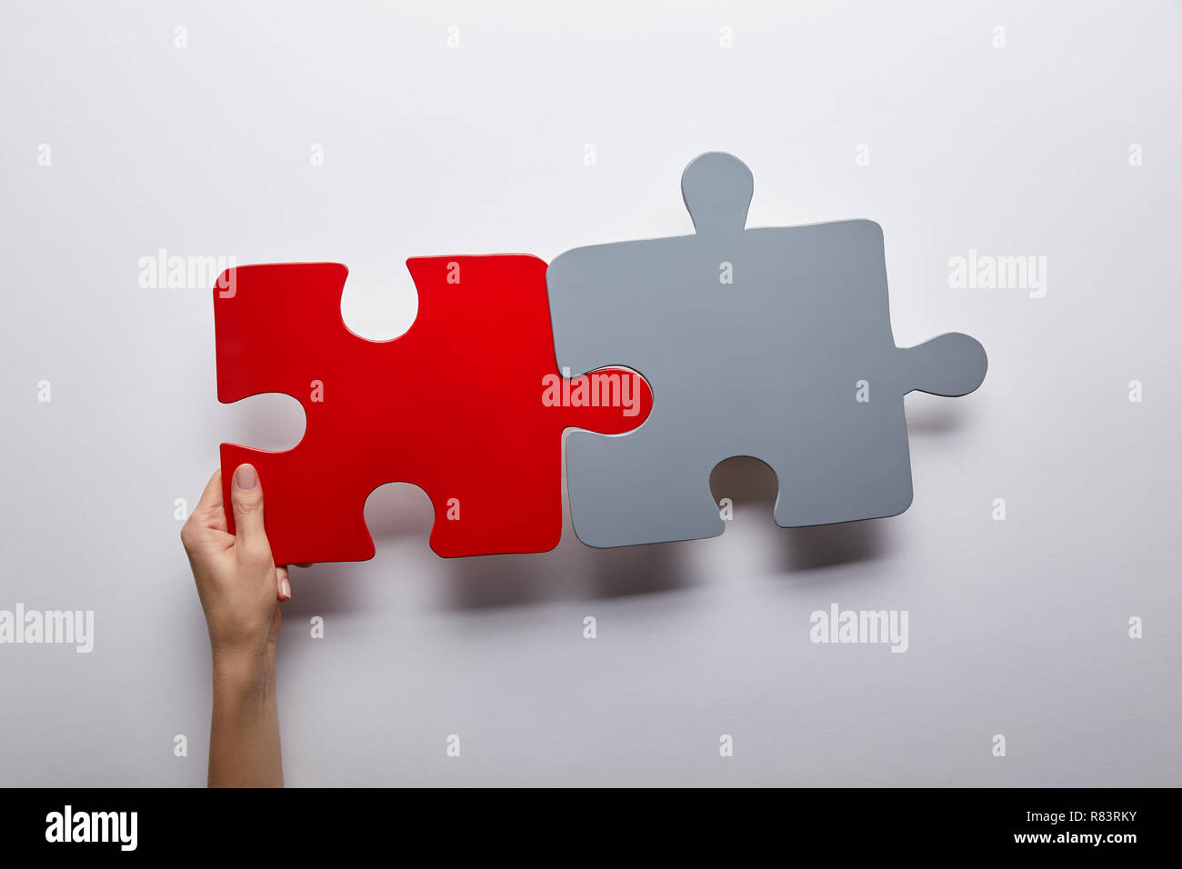 top view of red and grey puzzles problem solution symbol on grey ...