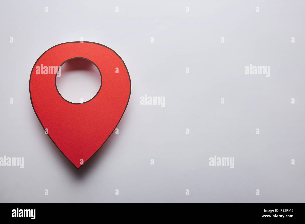 red geolocation icon on grey background Stock Photo - Alamy