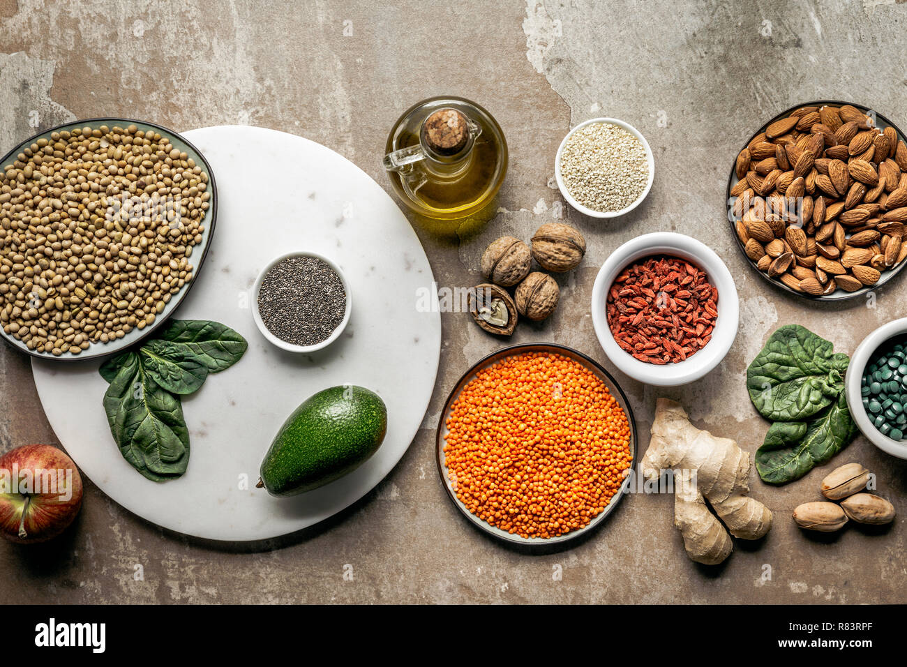 top view of superfoods, legumes and healthy ingredients on rustic ...