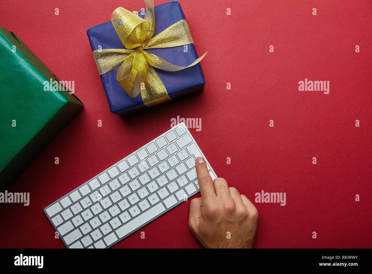 Top view of man finger pushing button on computer keyboard near ...