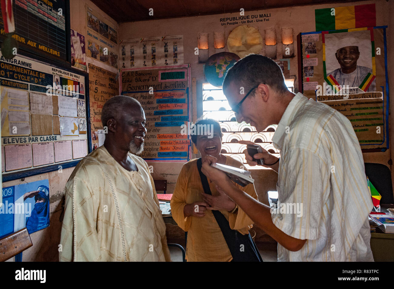 Mali, Africa. White caucasian volunteers and black african people enjoy ...