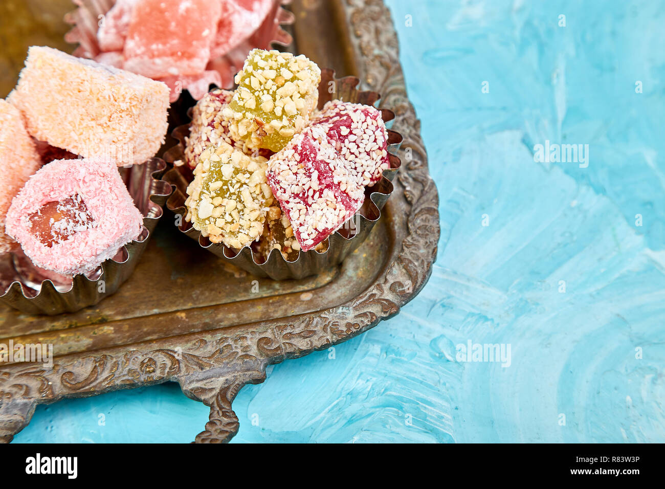 Set of various Turkish delight in a copper plate on metal tray blue ...