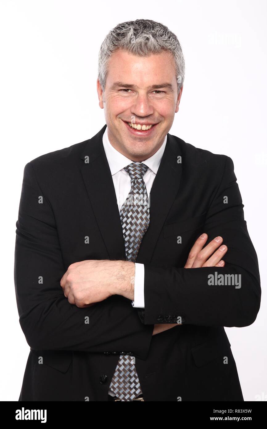 Portrait of a beautiful Caucasian man in front of a white background ...