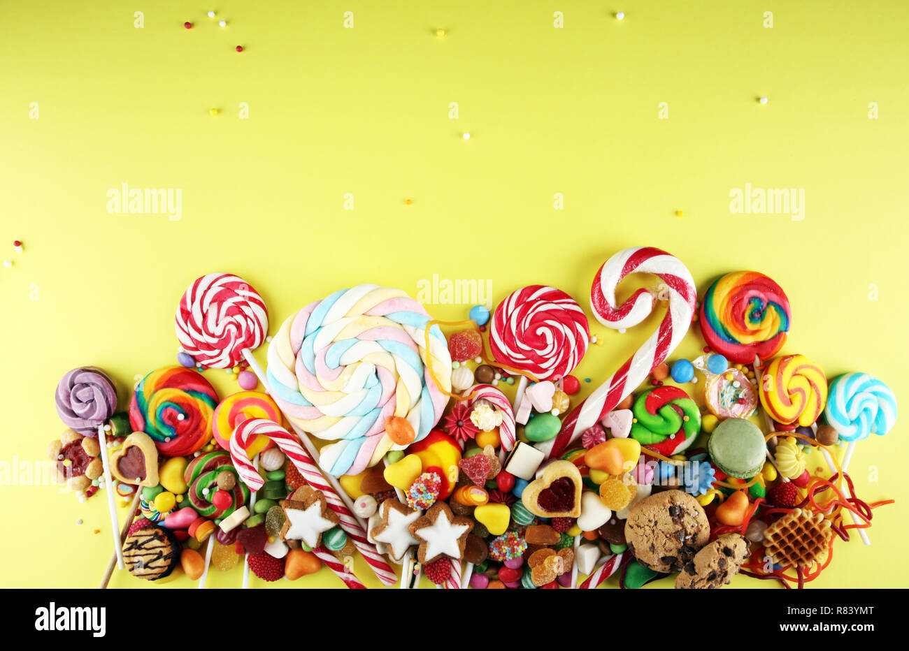 candies with jelly and sugar. colorful array of different childs sweets ...